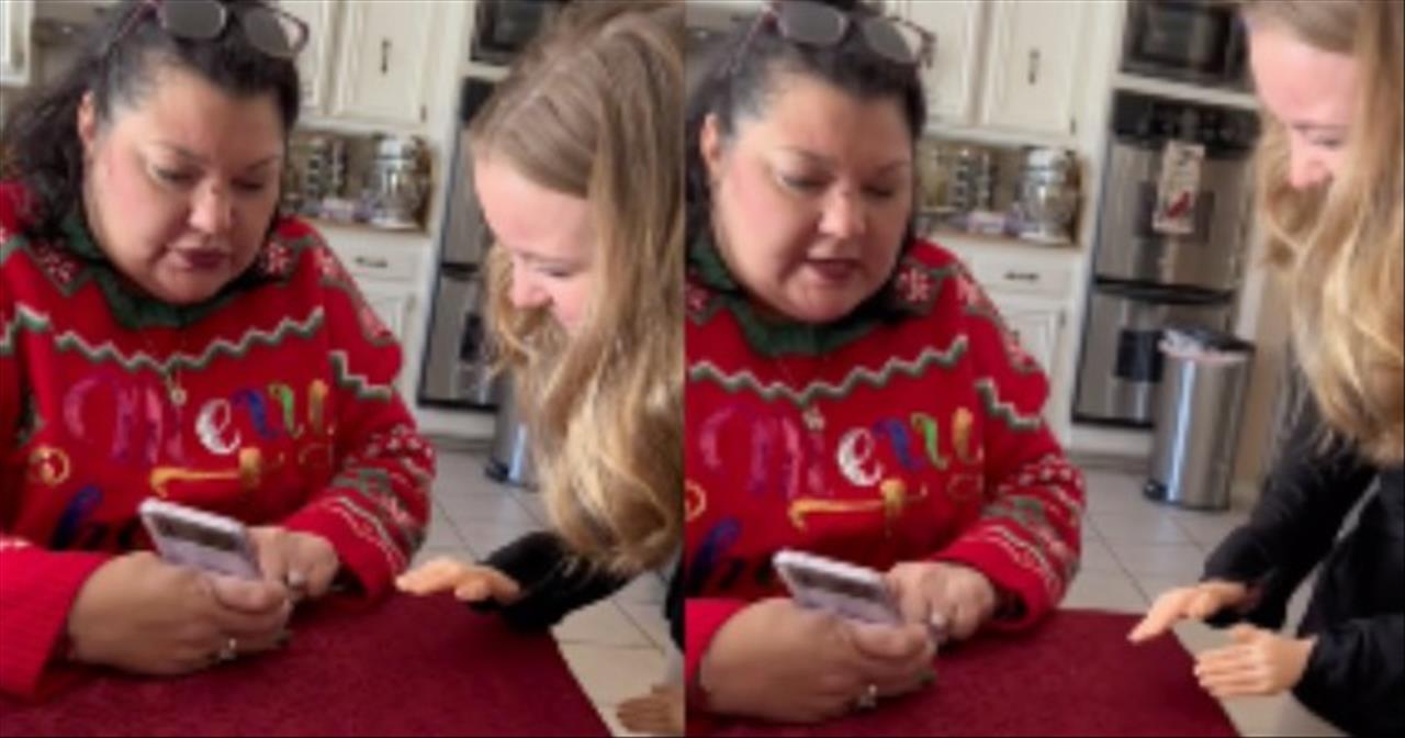 Woman Hilariously Doesn’t Notice The Tiny Hands Right in Front of Her